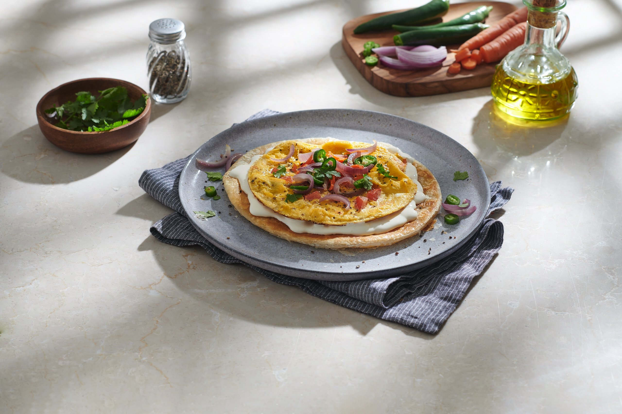 Paratha with cream cheese and vegetables omelette