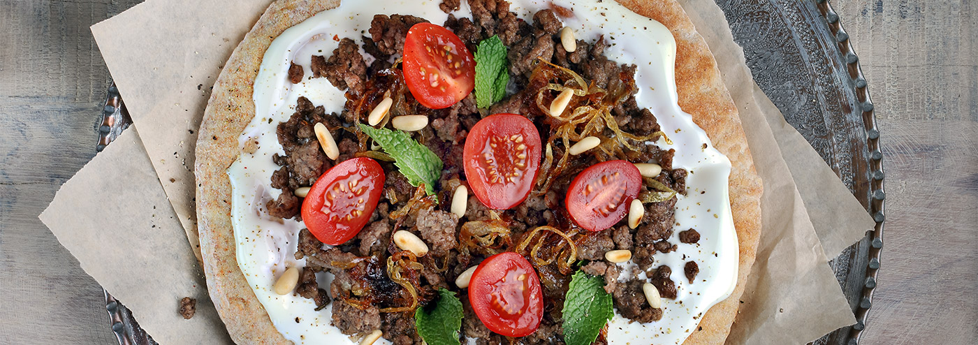Arabic bread with cream cheese, minced meat, caramelized onions ...