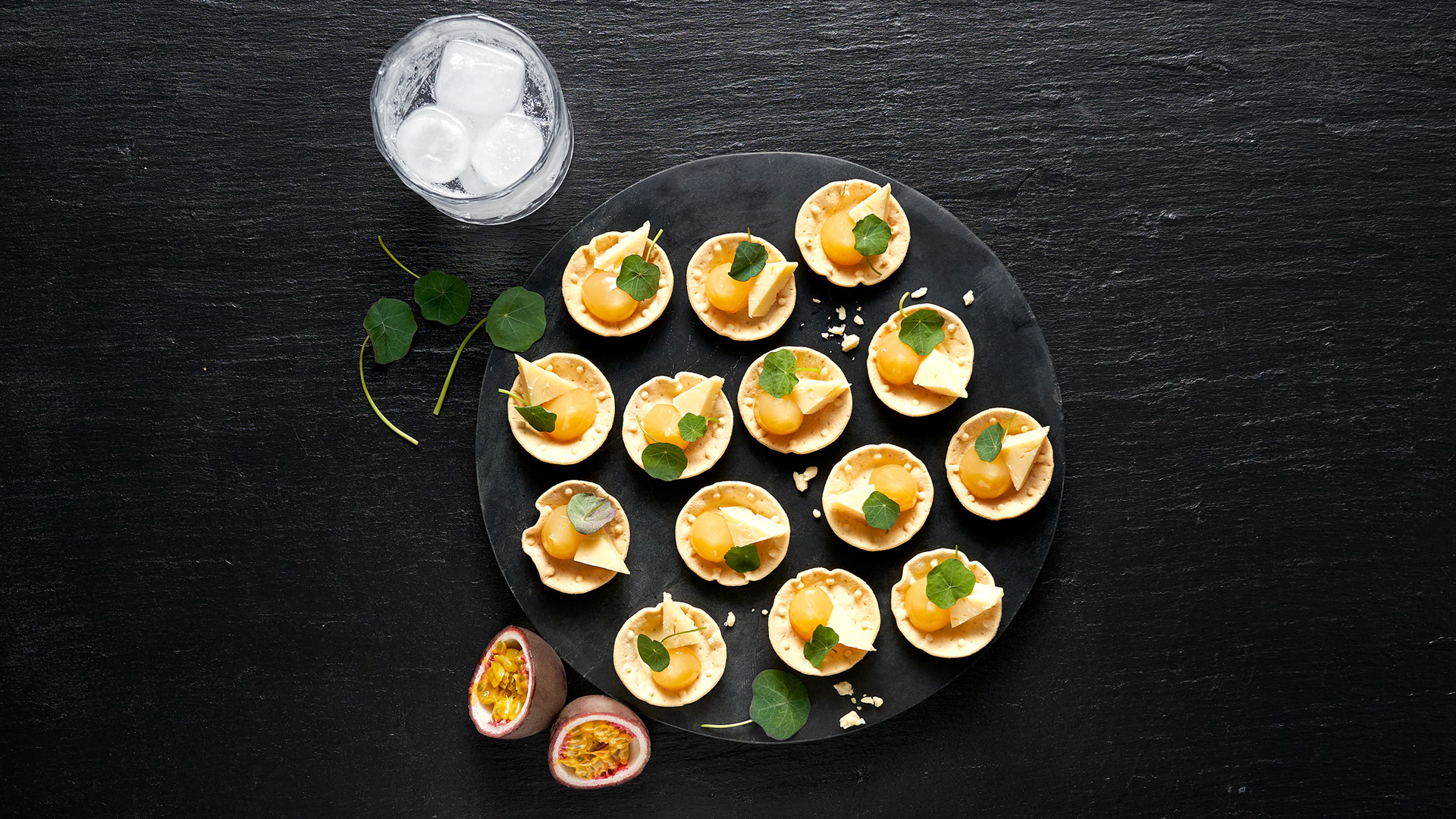 Matured Cheddar in croustades with passionfruit curd and chili | Castello®️